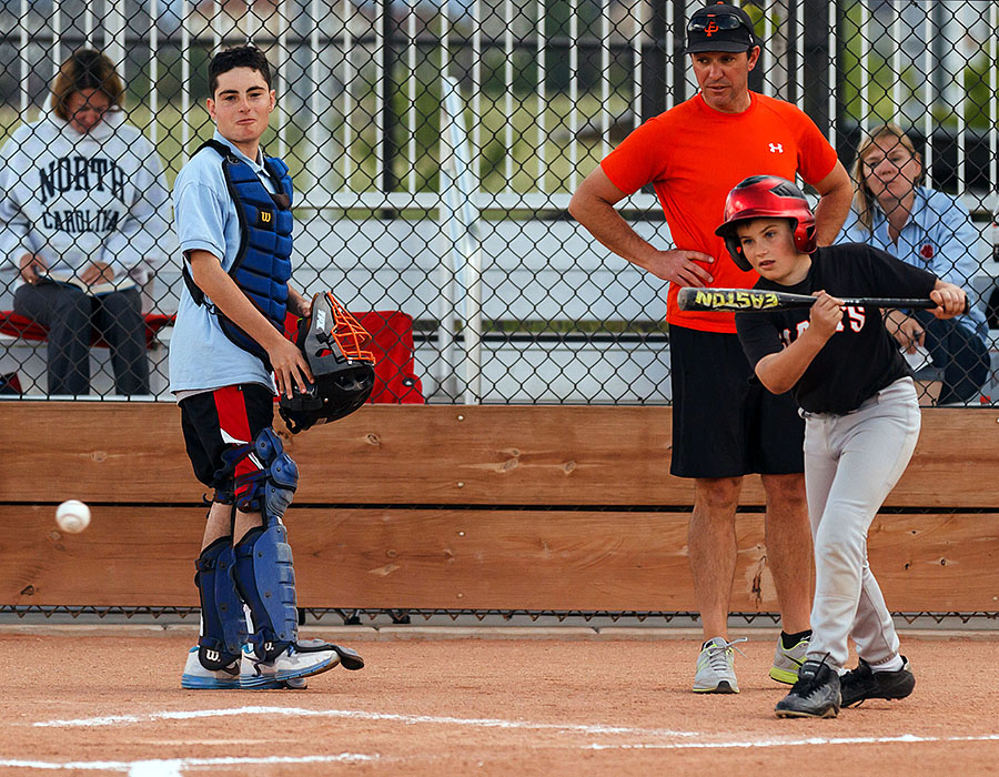 Kyle playing baseball in 2013 (and Dirk umping)